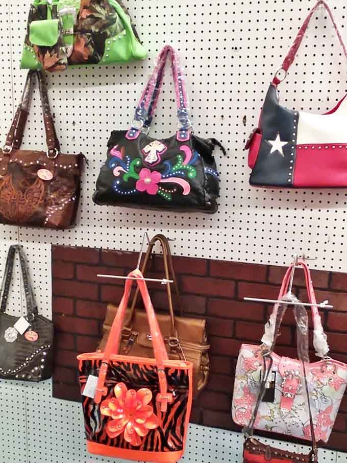 Handbags hanging like colorful fruit on a peculiar fashion tree. Each one promises to be the perfect companion for your next shopping expedition.