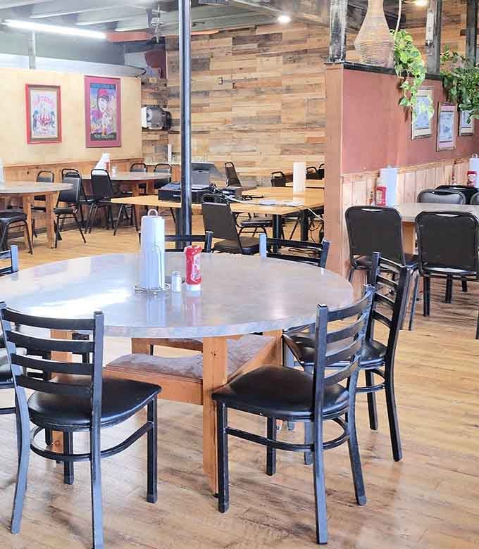 The dining room's warm wood tones and simple layout let you focus on what matters most: the extraordinary food and good company.