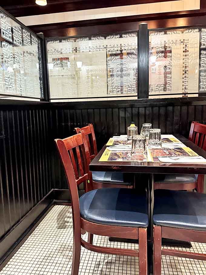 The timeless charm of wood paneling and patterned glass &ndash; deli d&eacute;cor that hasn't changed because it doesn't need to.