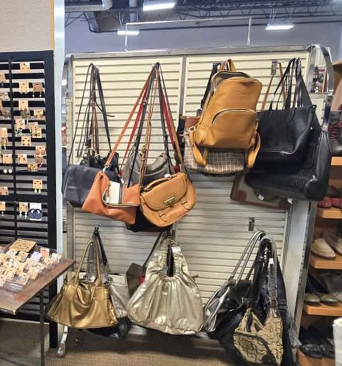 Handbag heaven! Designer-inspired and vintage purses hang like fashionable fruit, ripe for the picking at a fraction of retail prices.