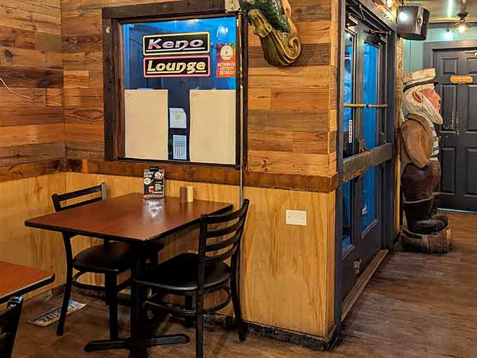 Cozy booth seating with nautical touches that transport you seaside without the sandy shoes aftermath.