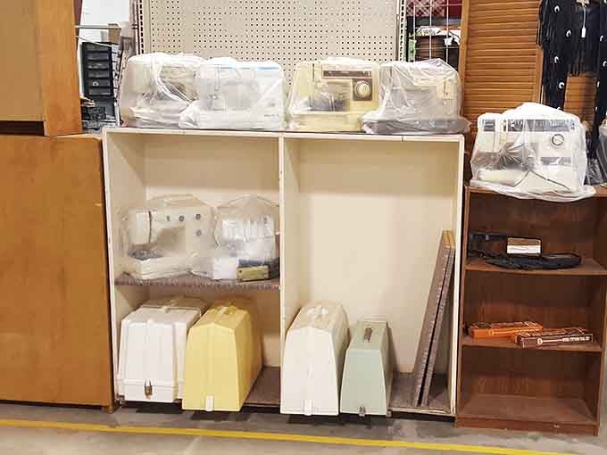 Sewing machines from grandma's era sit pristinely wrapped, ready to create new memories in the hands of crafters and menders.