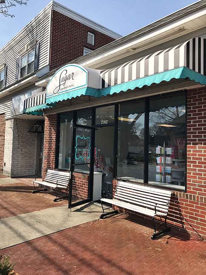 White benches outside invite you to sit and savor your treats while watching the world go by.