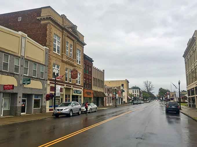 Rain-slicked streets reflect the town's character, making even wet weather look like an Edward Hopper painting come alive.