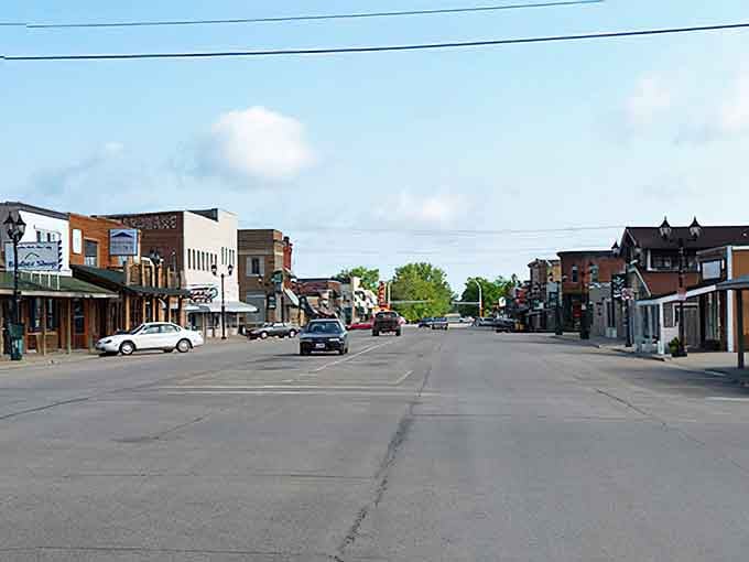 Main Street stretches wide and welcoming, with storefronts that have weathered decades without losing their character.