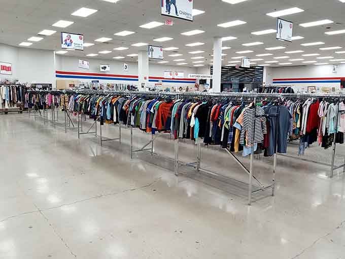 Endless clothing racks stretch toward the horizon like a rainbow of possibilities, proving bigger really is better for bargain hunters.