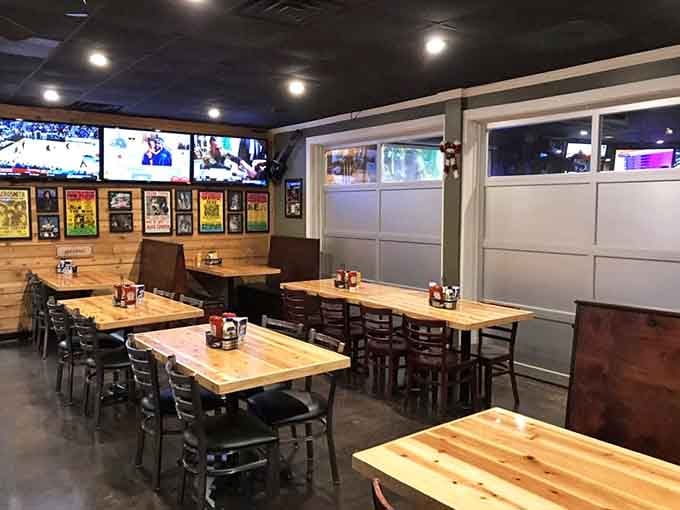 Rows of wooden tables under Beatles posters create that comfortable neighborhood spot everyone needs nearby.