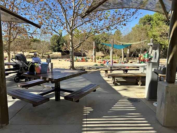 Shaded picnic tables let parents relax while keeping watchful eyes on the action, making everyone's day infinitely more pleasant.