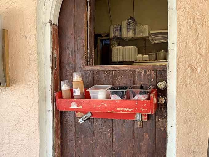 Even the condiments get their own rustic shelf because every detail matters when you're serving food this seriously good.
