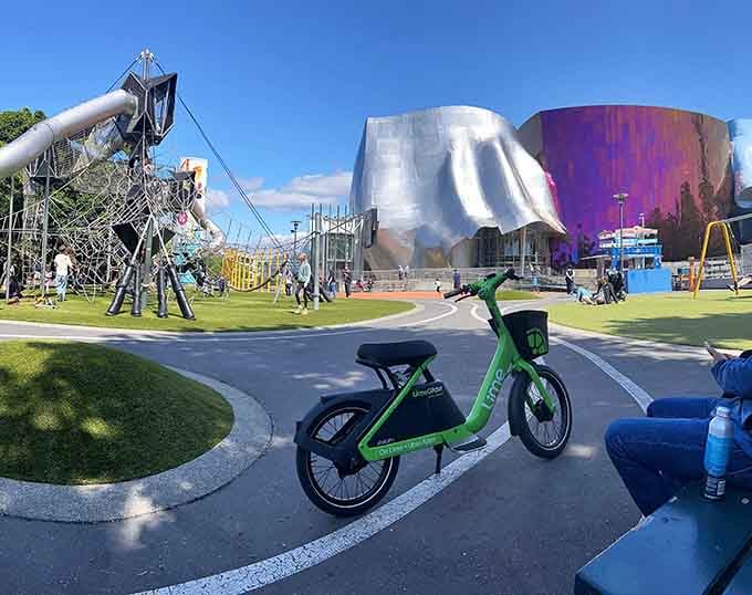 Someone parked their bike at what might be the coolest playground backdrop in the entire Pacific Northwest.