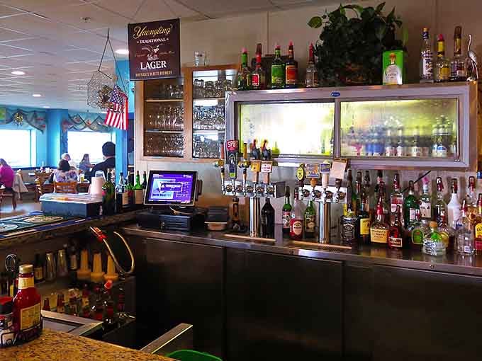 The bar stands ready for duty &ndash; a lighthouse of libations where sea stories get better with each pour and nobody checks the truth gauge.