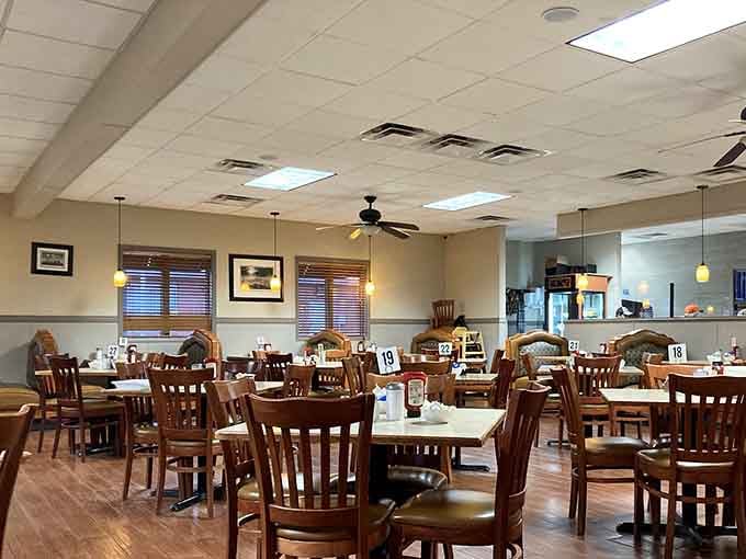 Ceiling fans, pendant lights, and comfortable seating create the perfect breakfast atmosphere for lingering.
