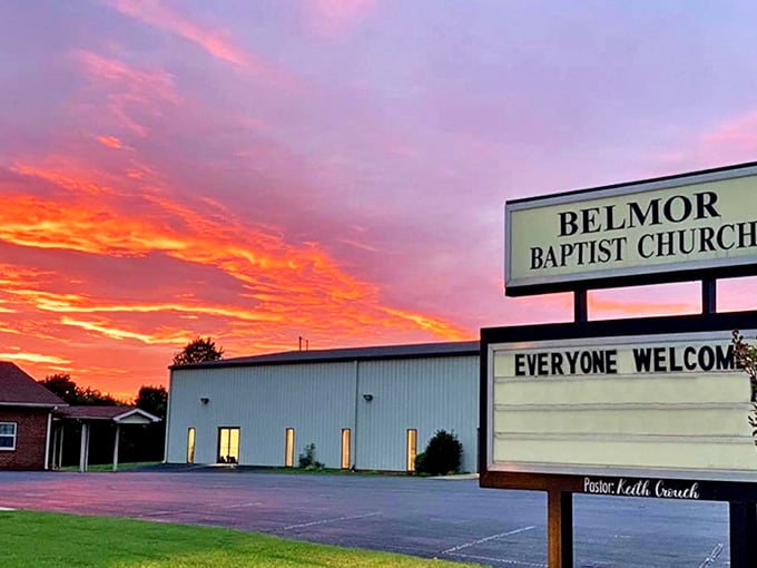 Even Mooresville's sunsets show off, painting the sky in shades that would make a flamingo jealous behind Belmor Baptist Church.