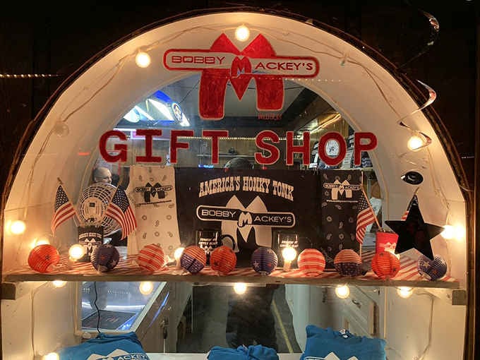 The gift shop glows invitingly, offering souvenirs to prove you survived your visit to Hell's Gate itself.