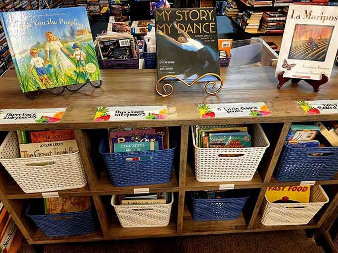 The children's section displays books at perfect kid height, making young readers feel like this magical place was designed just for them.