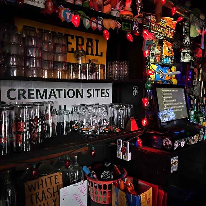 Cremation Sites signage behind the bar proves someone here has a wonderfully dark sense of humor going on.