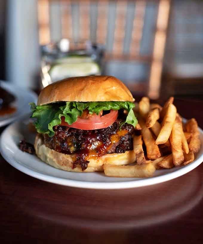 This isn't just a burger&mdash;it's an architectural achievement with structural integrity that somehow holds together until the very last bite.