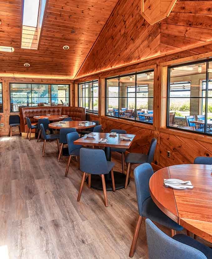 Modern comfort meets classic Cape Cod charm in a dining space designed for lingering over good meals.