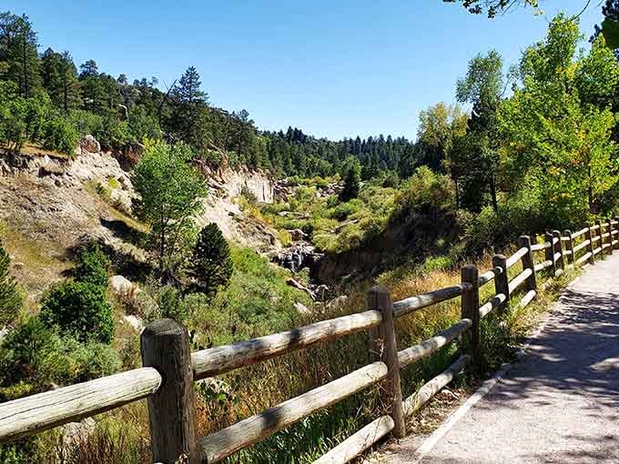 Wooden fences guide you safely along trails where every turn reveals another reason to stop and stare.