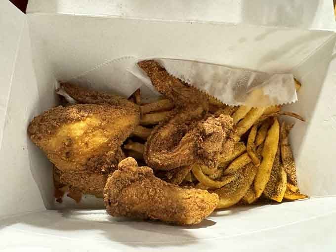Fried chicken wings and fries deliver that perfect crunch, proving Chaps masters every protein they touch with fire.