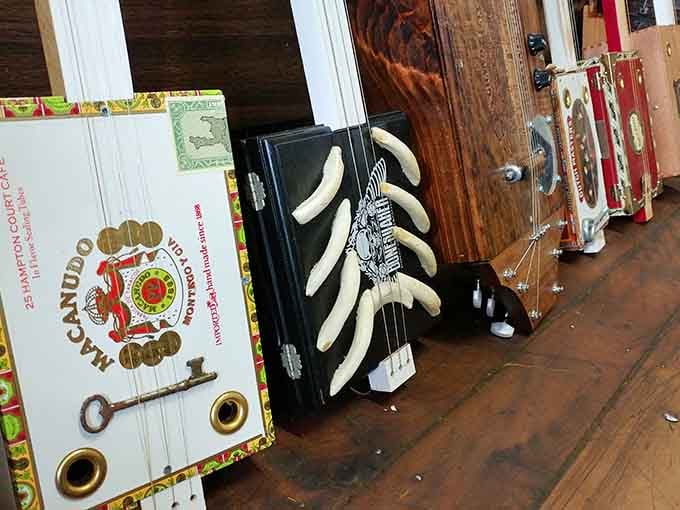 Cigar box guitars line up like soldiers of sound. Resourceful craftsmanship transforms tobacco packaging into instruments with surprising soul.