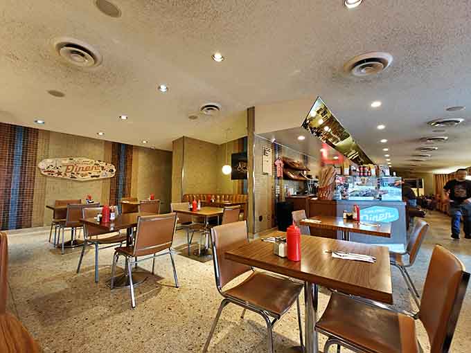 Warm lighting and comfortable seating create the perfect atmosphere for lingering over pancakes and conversation.