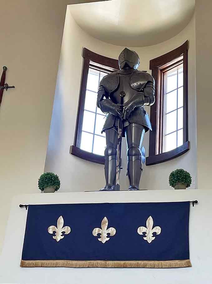 A suit of armor stands guard, silently judging your posture and reminding you to sit up straight.