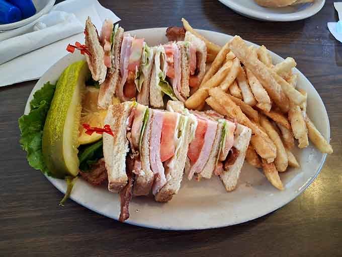 The club sandwich&mdash;a skyscraper of ingredients that requires jaw gymnastics but rewards you with the perfect bite every time.