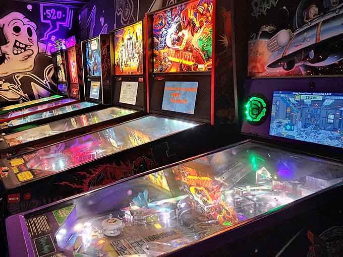 Multiple pinball machines lined up together create a symphony of bells, bumpers, and childhood memories come alive.
