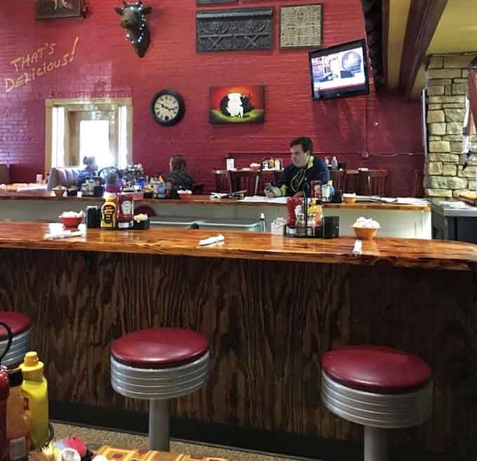 The counter isn't just a place to eat&mdash;it's front-row seating to the breakfast theater, complete with red vinyl VIP stools.