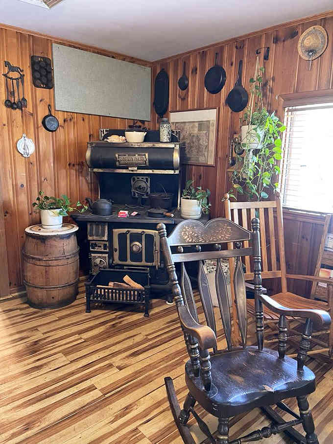 An antique stove sits ready for its close-up, adding authentic charm to every corner.