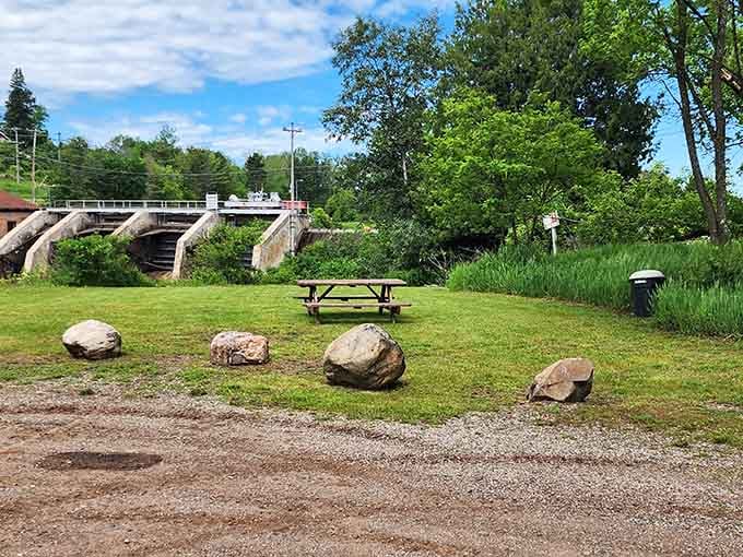 Crystal Falls Veteran's Park provides peaceful picnic spots where families gather and the Paint River flows gently past.