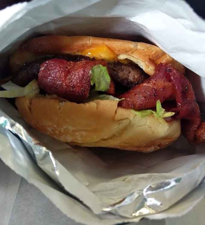 Bacon draped over beef like a delicious blanket, this burger understands that more is sometimes exactly right.