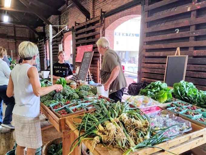 The Danville Farmers' Market bursts with fresh local produce, where conversations flow as naturally as the nearby Dan River.