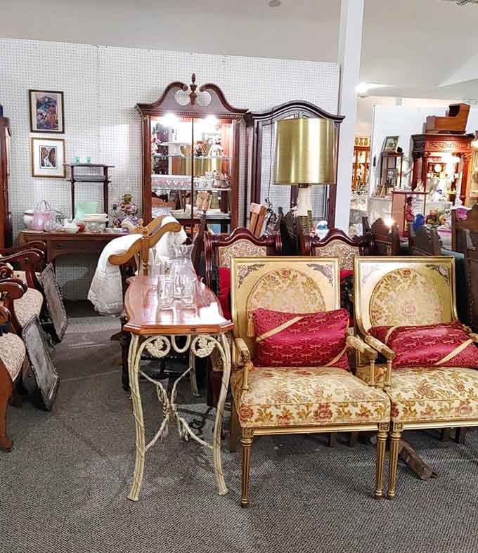 Ornate chairs and china cabinets create a scene straight from Downton Abbey, minus the British accents and drama.