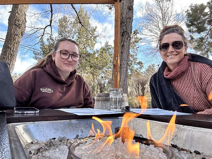 Outdoor dining with fire features&mdash;because nothing improves breakfast conversation like watching flames dance while you sip coffee.