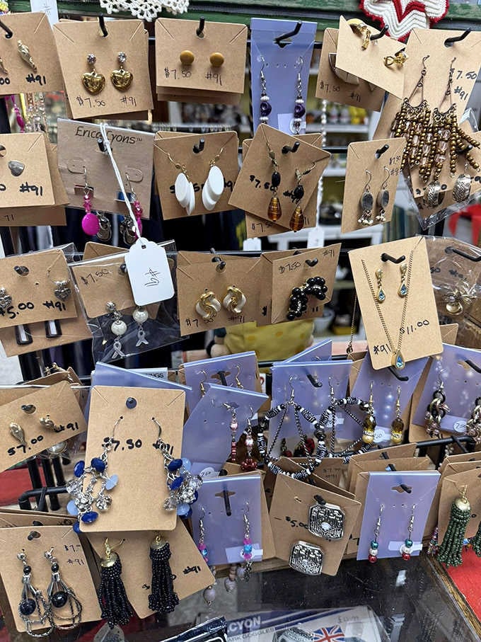 Vintage jewelry dangles like tiny time capsules, each pair of earrings telling stories of proms, weddings, and nights on the town from eras gone by.