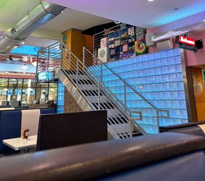 That stairway leads to more seating and possibly another dimension where the 1950s never actually ended at all.