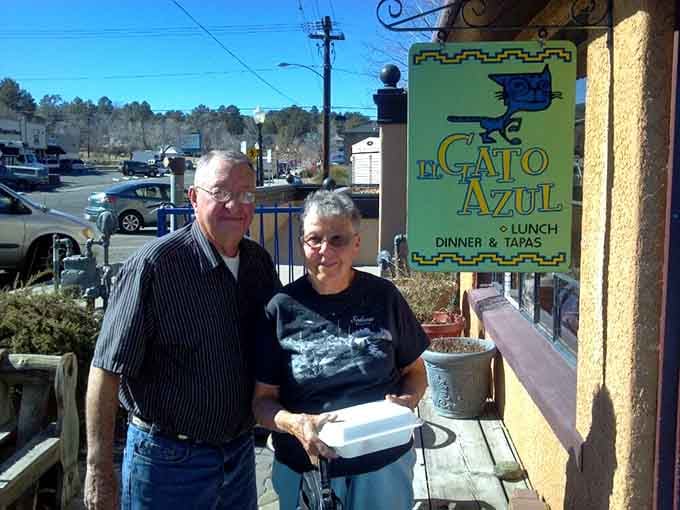 Happy diners enjoying their takeout, because sometimes El Gato Azul's flavors need to come home with you immediately.