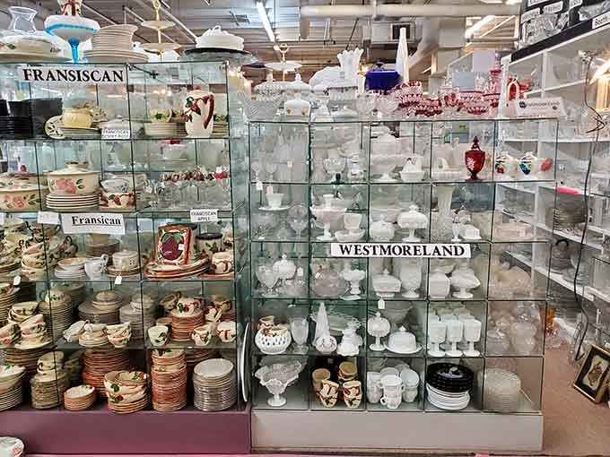 Glass display cases protecting the delicate treasures, because some things are too precious for casual browsing hands.