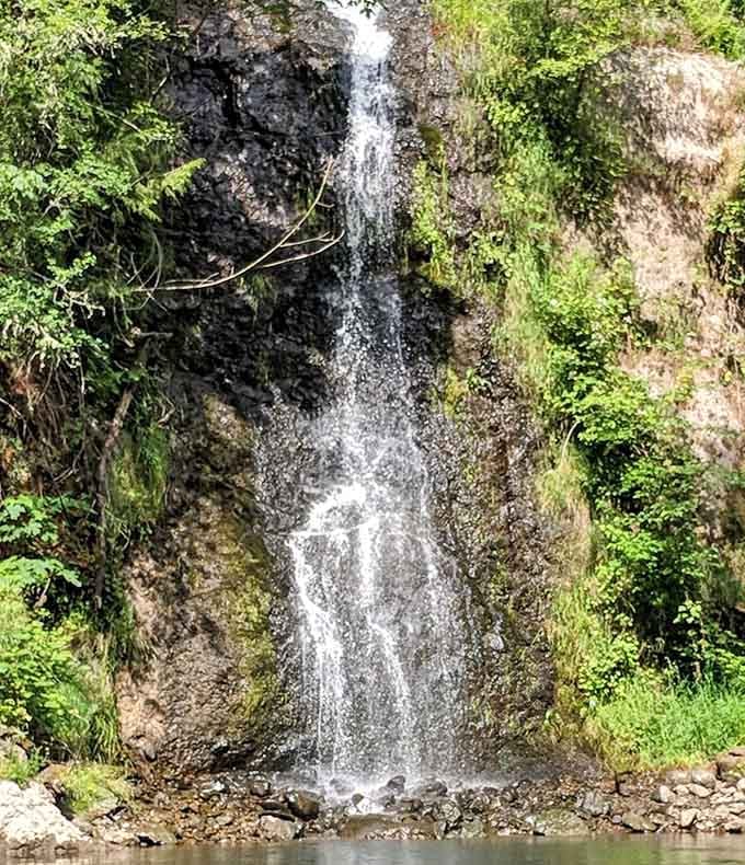 The waterfall doesn't roar so much as it gently suggests that maybe, just maybe, you should slow down and stay awhile.