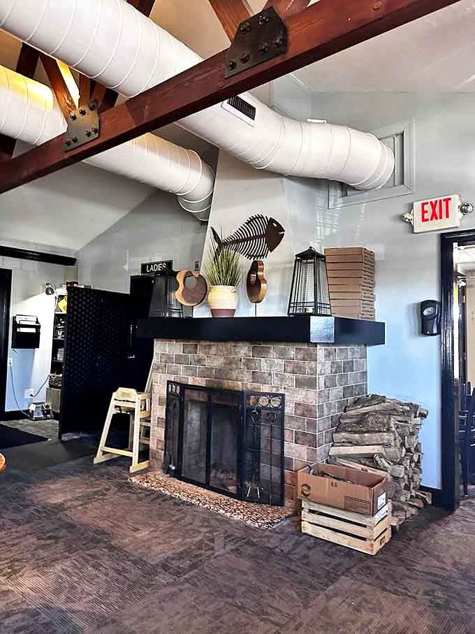 That fireplace isn't just for show &ndash; it's the heart of the restaurant, pumping warmth and ambiance through the dining room like a culinary circulatory system.