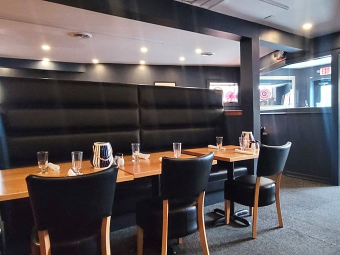 Sleek dining booths offer intimate spaces for savoring every bite, because great meals deserve comfortable, stylish surroundings.