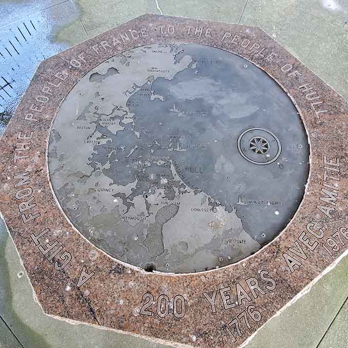 Memorial plaques honor those who served here, reminding us that these concrete structures represent real people protecting real homes and families.
