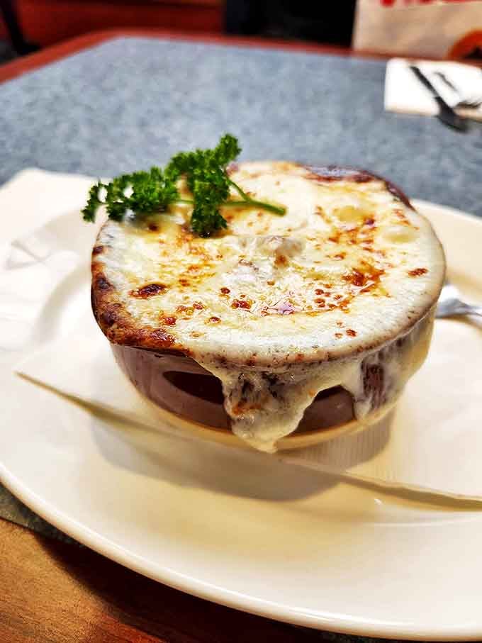 French onion soup that's wearing a melted cheese beret. A bubbling cauldron of comfort topped with a golden crown.
