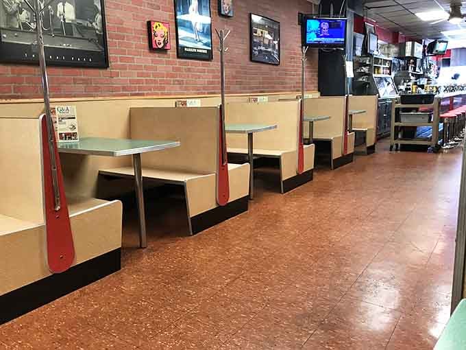 Classic diner booths lined up like soldiers, ready to serve families just like they did decades ago.