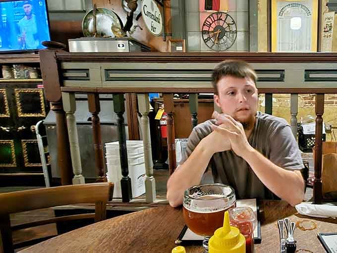 That contemplative look says it all: sometimes you just need a moment to appreciate really good German food.