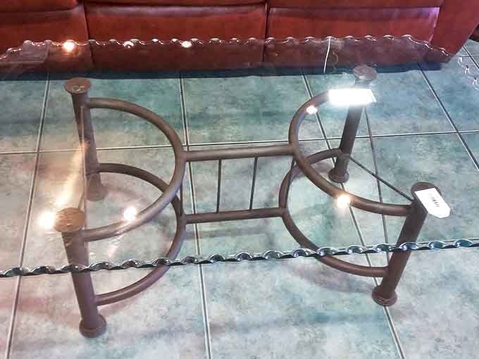 Coffee table or modern sculpture? This glass and metal piece would cost a fortune new but here waits patiently for its second chapter.