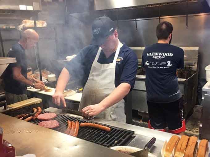 Watch the grill masters at work, turning out perfectly cooked dogs and burgers with practiced efficiency and skill.