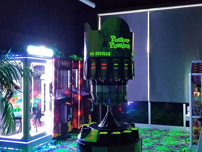 Pucker Powder dispensers glow invitingly, offering a sweet and sour treat to fuel your mini golf adventures throughout the course.